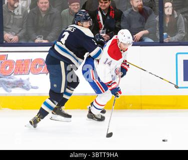 Montreal Canadiens center Nick Suzuki (14) plays against the Detroit ...