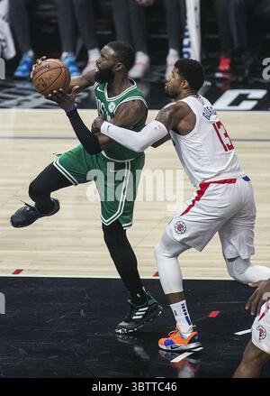 Boston Celtics' Jaylen Brown (7) goes up to shoot against Philadelphia ...