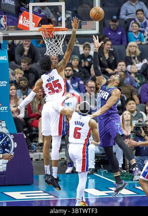 Detroit Pistons forward Christian Wood (35) dunks over Phoenix Suns ...