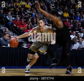 Iowa guard Connor McCaffery drives up court during the second half of ...