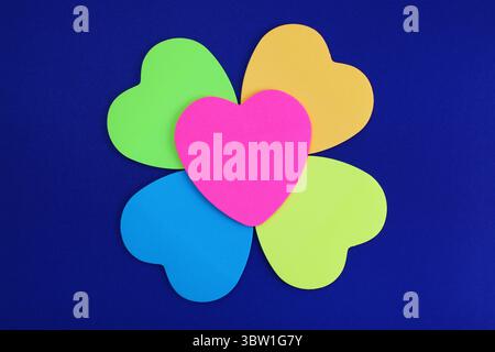 Heart-shaped sticky notes that form a flower Stock Photo - Alamy