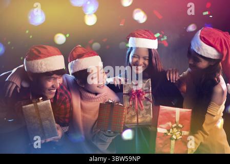 Christmas celebration concept, Young asian woman holding christmas ...