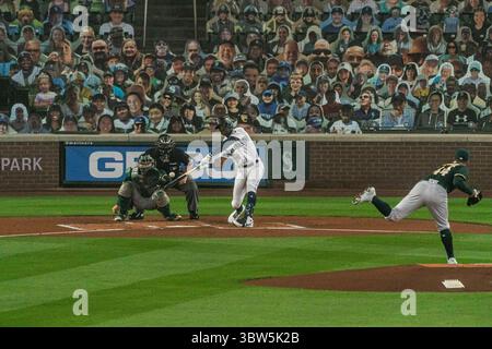 Seattle Mariners Kyle Lewis bats against the texas Rangers during a ...