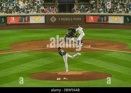 Seattle Mariners Kyle Lewis bats against the texas Rangers during a ...