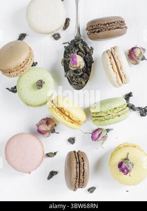 Top view of colored macaroons on white background Stock Photo - Alamy