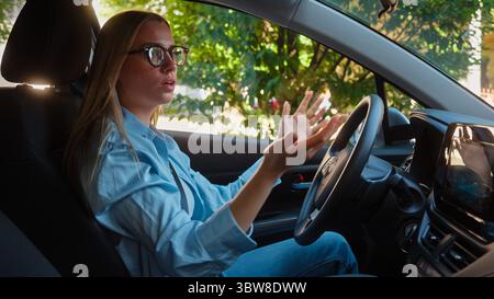 angry girl driving a car Stock Photo - Alamy