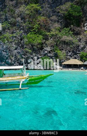 A unique design of a Filipino long-tail boat that is a signature in the ...