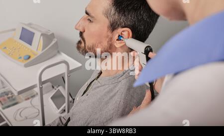 Tympanometry. Ent doctor doing tympanometry and test of middle-ear ...