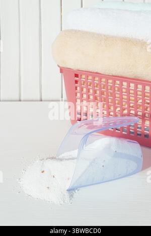 White washing powder with towels and a laundry conditioner bottle Stock ...