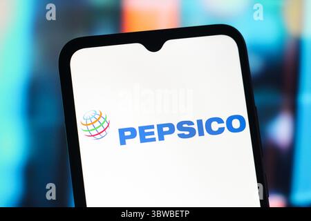 In this photo illustration, a PepsiCo logo is seen displayed on the ...