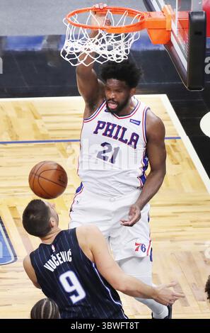 Philadelphia 76ers' Joel Embiid dunks the ball during an NBA basketball ...