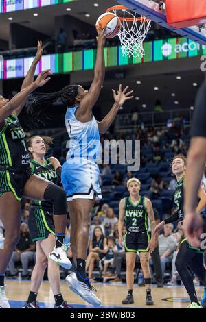 Chicago Sky center Elizabeth Williams, left, battles for the ball ...