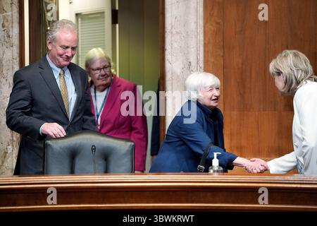 Treasury Secretary Janet Yellen greets Zambia's President Hakainde ...