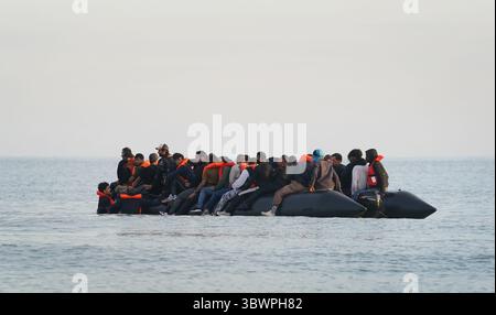 A small boat carrying people thought to be migrants leaves Gravelines ...