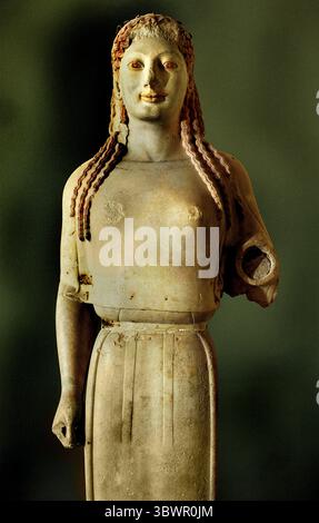 Marble kore statue depicting a young woman, characteristic of Archaic ...