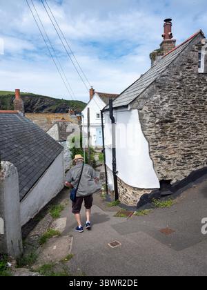 port isaac, england, 22 june 2025: tourists above harbour in cornish ...