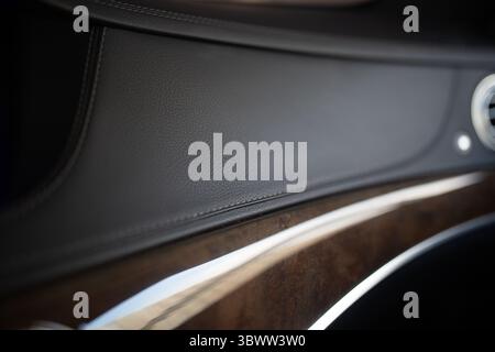 Modern car panel, with leather and backlight Stock Photo - Alamy