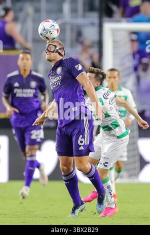 Orlando City defender Robin Jansson (6) kicks the ball away from Inter ...