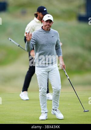 Rory McIlroy, of Northern Ireland, reacts after missing a putt on the ...