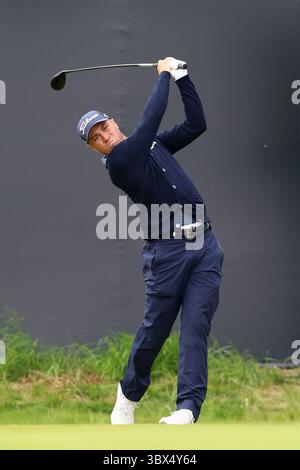 Justin Thomas hits his tee shot on the 12th hole during the first round ...