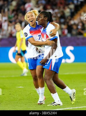 England's Michelle Agyemang (right) celebrates scoring their side's ...