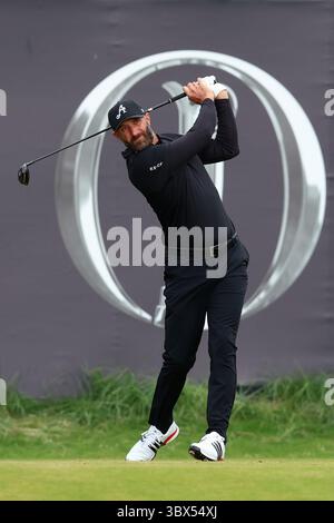 Dustin Johnson hits his tee shot on the second hole during the first ...