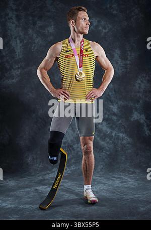 Markus Rehm of Germany poses with the gold medal for the men's T64 long ...