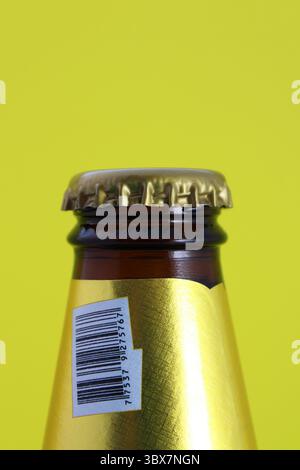 Barcode label on brown beer bottle Stock Photo - Alamy