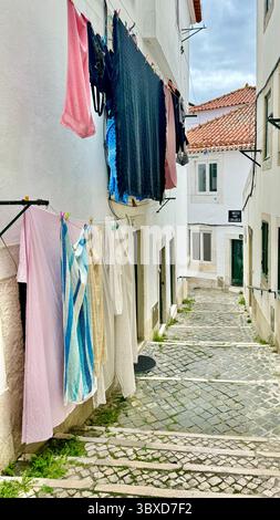 Washing hanging on clotheslines outside of residential buildings in ...