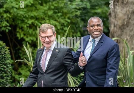 German Foreign Minister Johann Wadephul, left, and Japanese Prime Minister Shigeru Ishiba shake ...