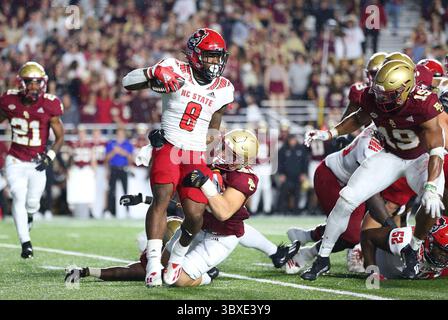 Running back Ricky Person runs a position drill for NFL scouts during ...