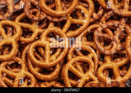 Salt pretzels, top view, full frame Stock Photo - Alamy
