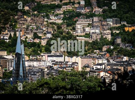 An aerial view of a mountainous landscape with lush green forest in a ...