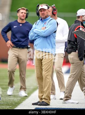 Liberty head coach Hugh Freeze watches as players warm up prior to an ...