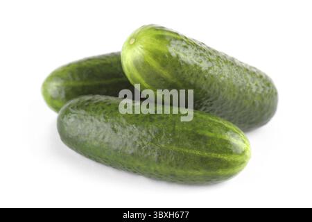 Pile of fresh gherkins, close up, isolated Stock Photo - Alamy