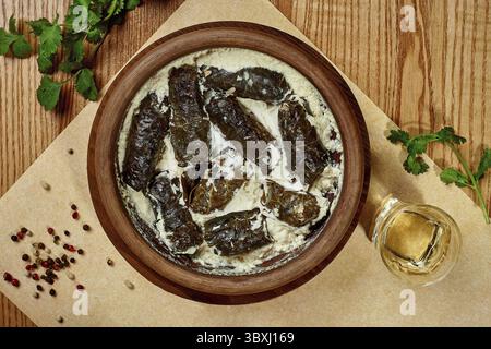 leaves dolma served in clay pot Stock Photo - Alamy