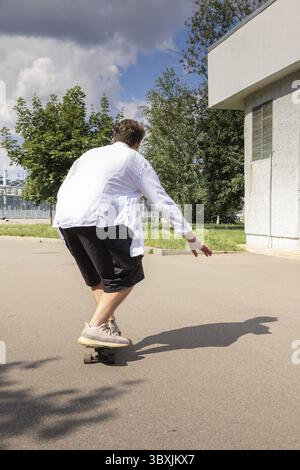 Full length photo of young man happy positive smile present bank card ...