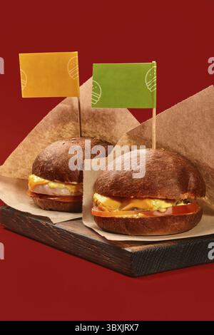 Fresh fluffy buns sprinkled with sesame seeds on a white plate, Close ...