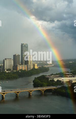 Rainey Street Austin Texas skyline with rainbow over Ladybird Lake and ...