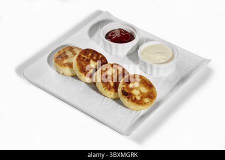 Golden brown syrniki, traditional Eastern European cheese pancakes ...