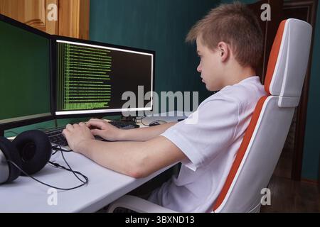 Software development concept, Male programmer checking data codes on ...