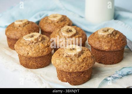 Banana muffin, side view, close up. Cupcakes on blue napkin Stock Photo ...