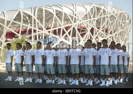 Chinese solders, dressed in sport clothing, do drills near the National ...