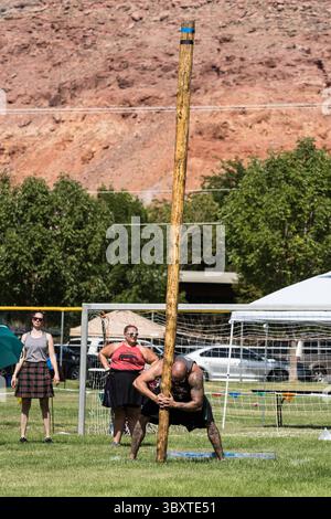 On September 18, a man prepares his bow and arrow for an archery ...