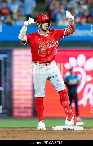 Los Angeles Angels' Zach Neto slides into second base after hitting a ...