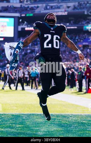 Philadelphia Eagles' Miles Sanders (26) gets wrapped up by Arizona ...