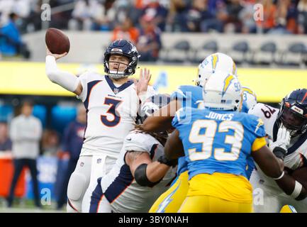 Denver Broncos quarterback Drew Lock (3) walks on the field before an ...