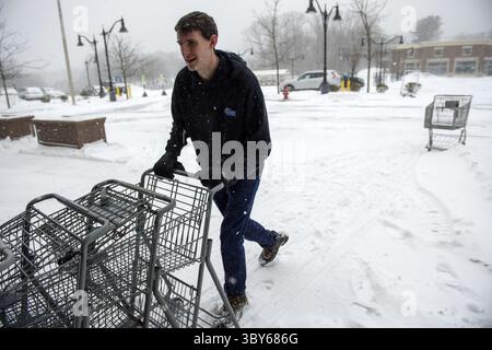 Grocery shopping during a winter snow storm during the Winter season in ...