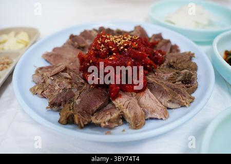 Korean Boiled Beef Slices with Spicy Pollock Salad and Sesame Seeds ...