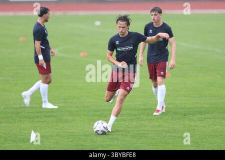 Harry Barbrook, of Chelmsford City warming up ahead of the match ...